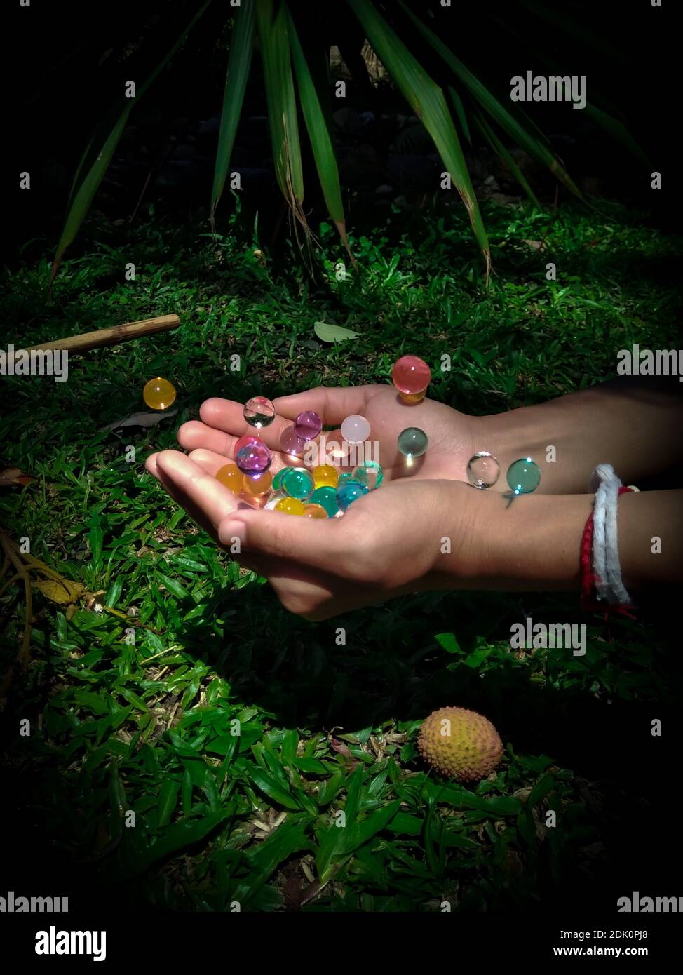 Holding Marbles High Resolution Stock Photography and Images - Alamy