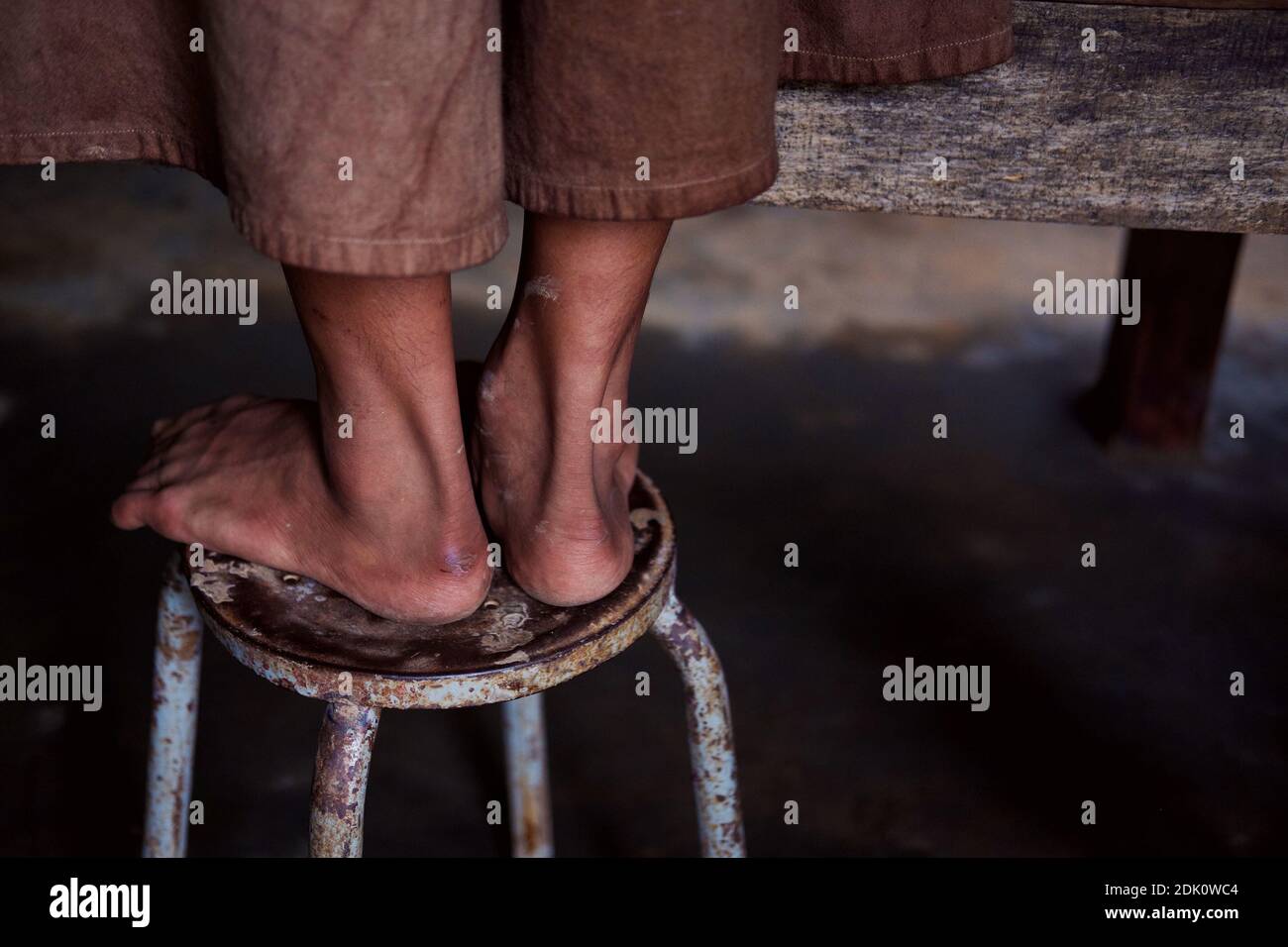 Human foot stool hi-res stock photography and images - Alamy