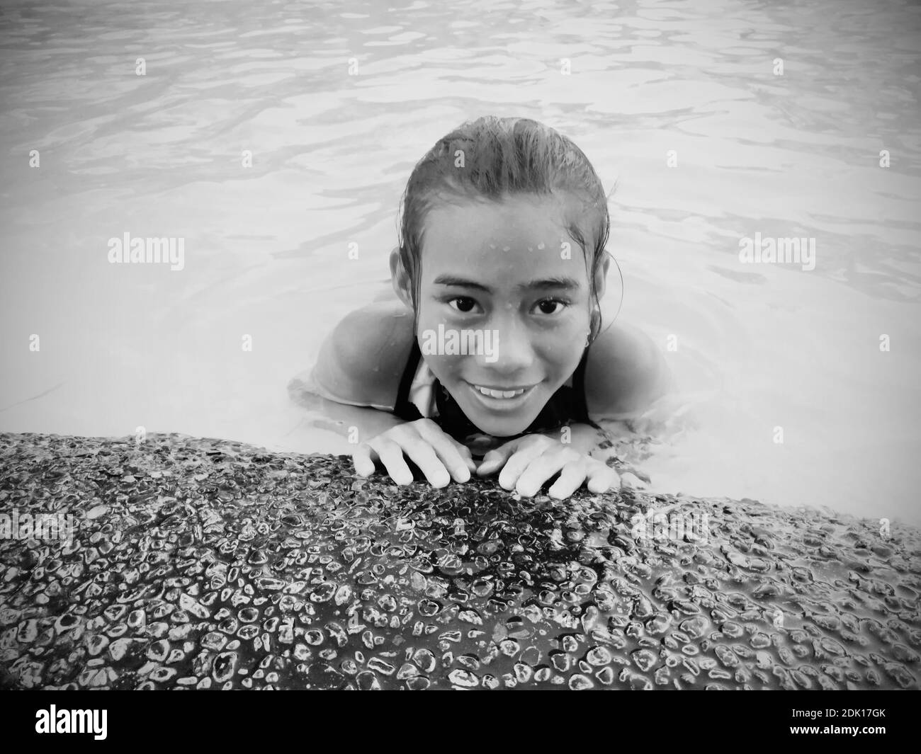 Portrait Of Girl Swimming In Pool Stock Photo - Alamy