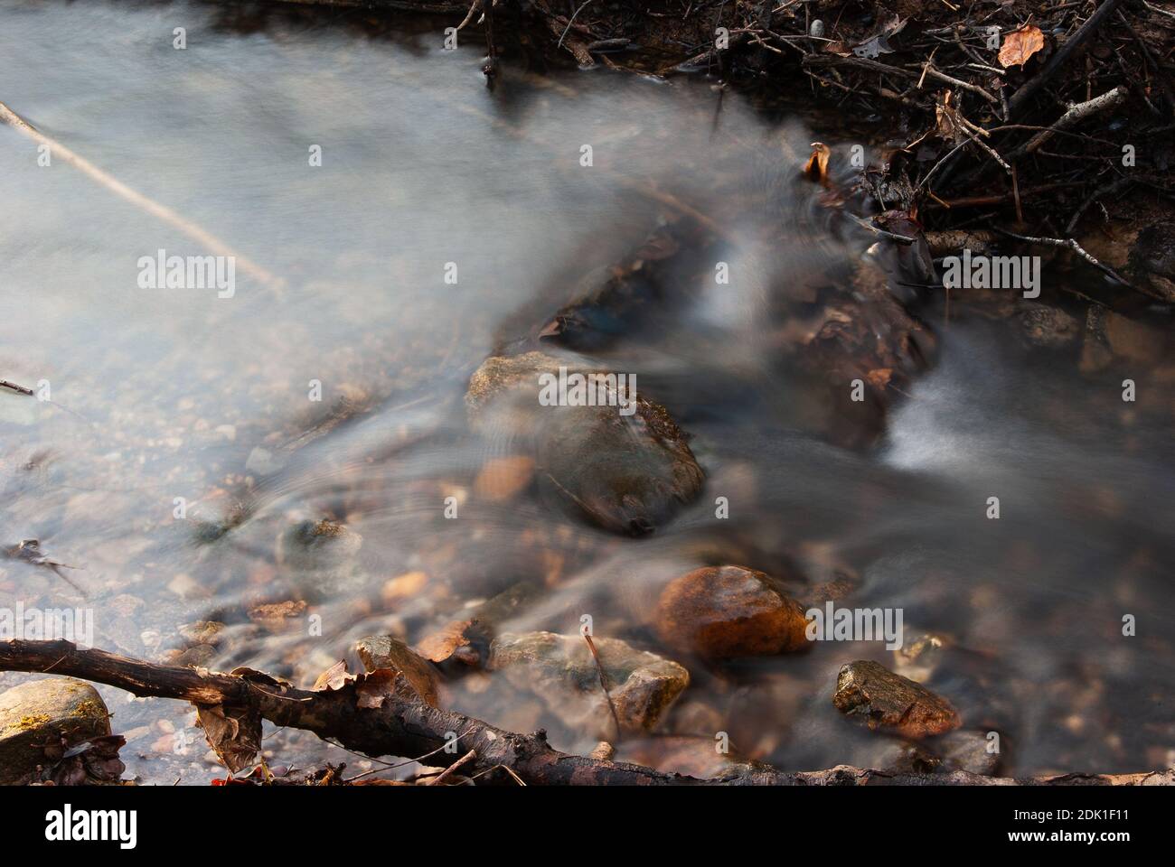 Water Flowing Through Rocks Stock Photo - Alamy