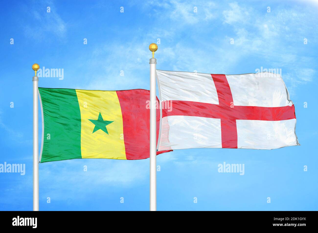 Senegal and England two flags on flagpoles and blue cloudy sky Stock ...