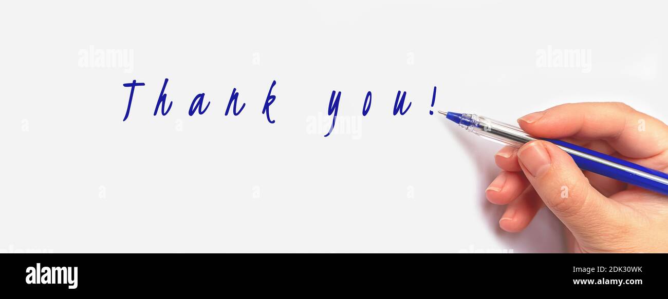 Large banner with caucasian hand writing blue pen on light background ...