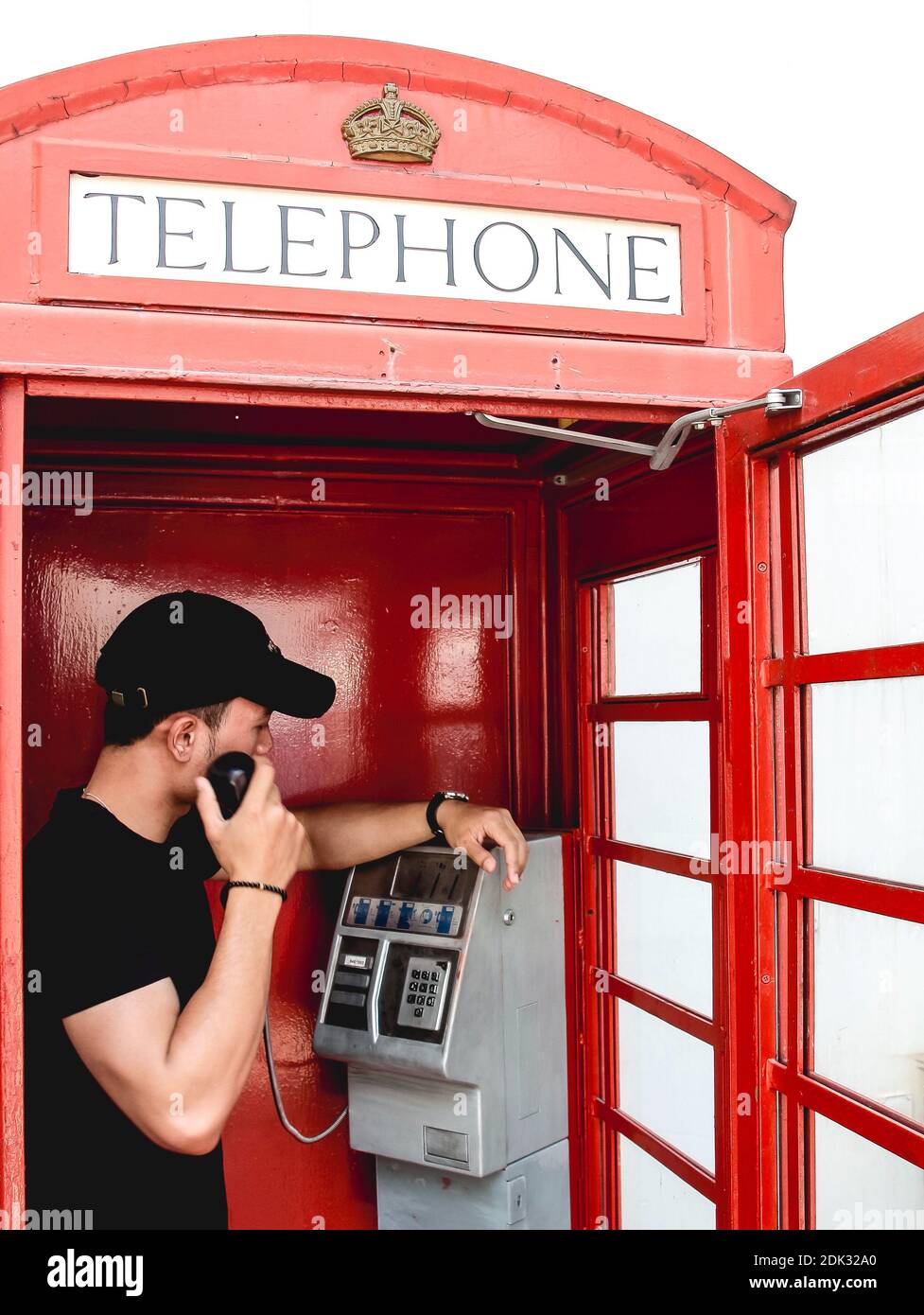 Man in telephone booth hi-res stock photography and images - Alamy