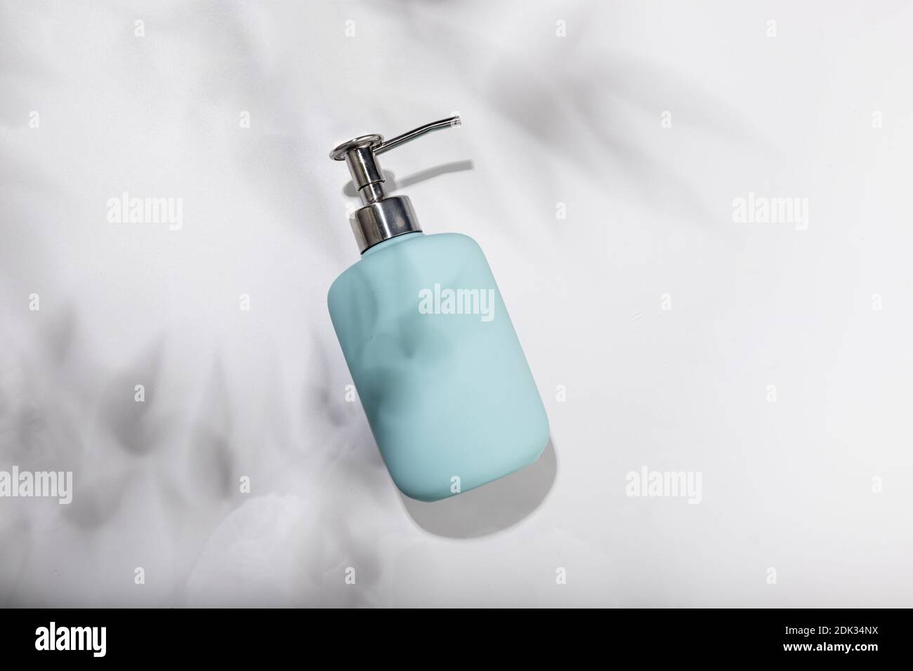 A top view closeup of a blue liquid soap container on a Stock Photo - Alamy