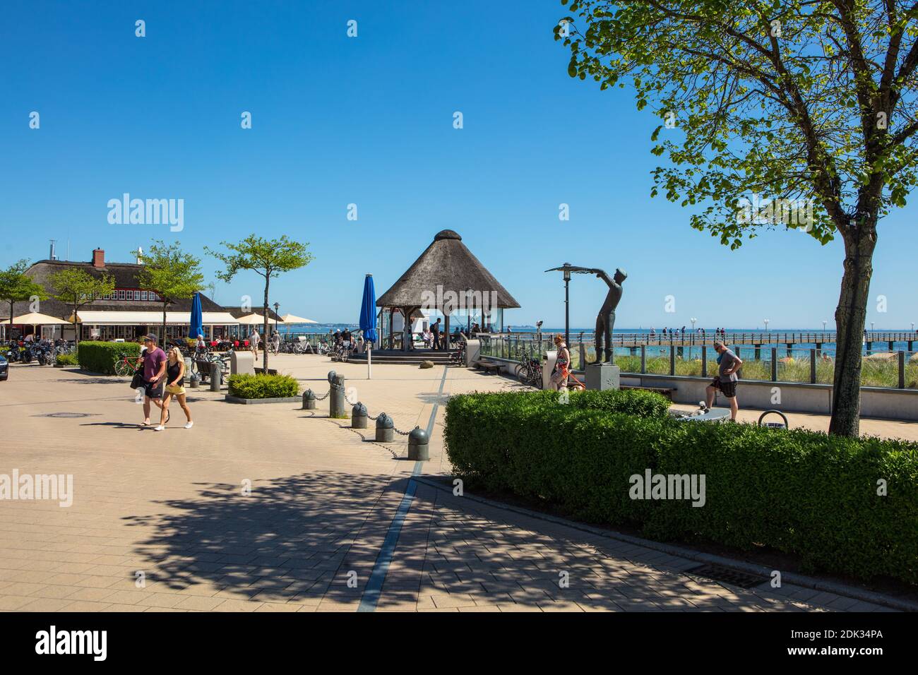 Germany, Schleswig-Holstein, Haffkrug, Promenade at the pier Stock ...