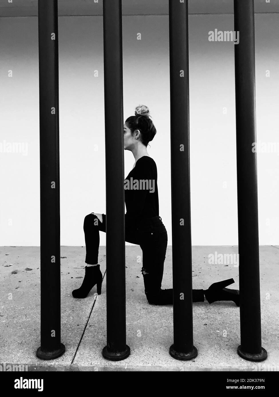 Women Prison Bars High Resolution Stock Photography and Images - Alamy