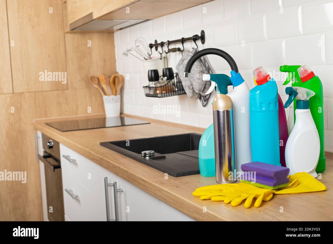 Colorful cleaning products in the kitchen Stock Photo - Alamy