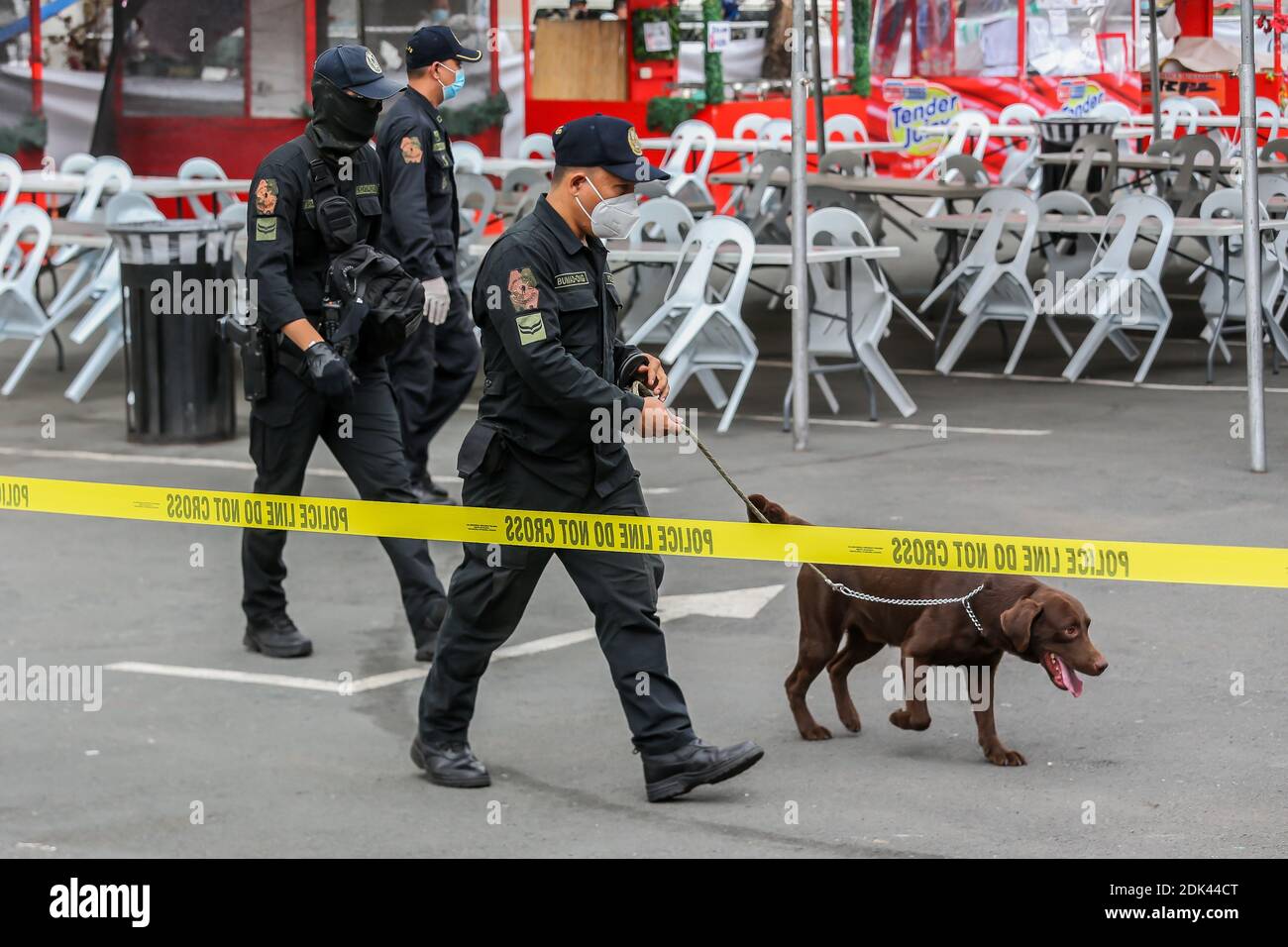 Quezon, Philippines. 15th Dec, 2020. Policemen are seen during a ...
