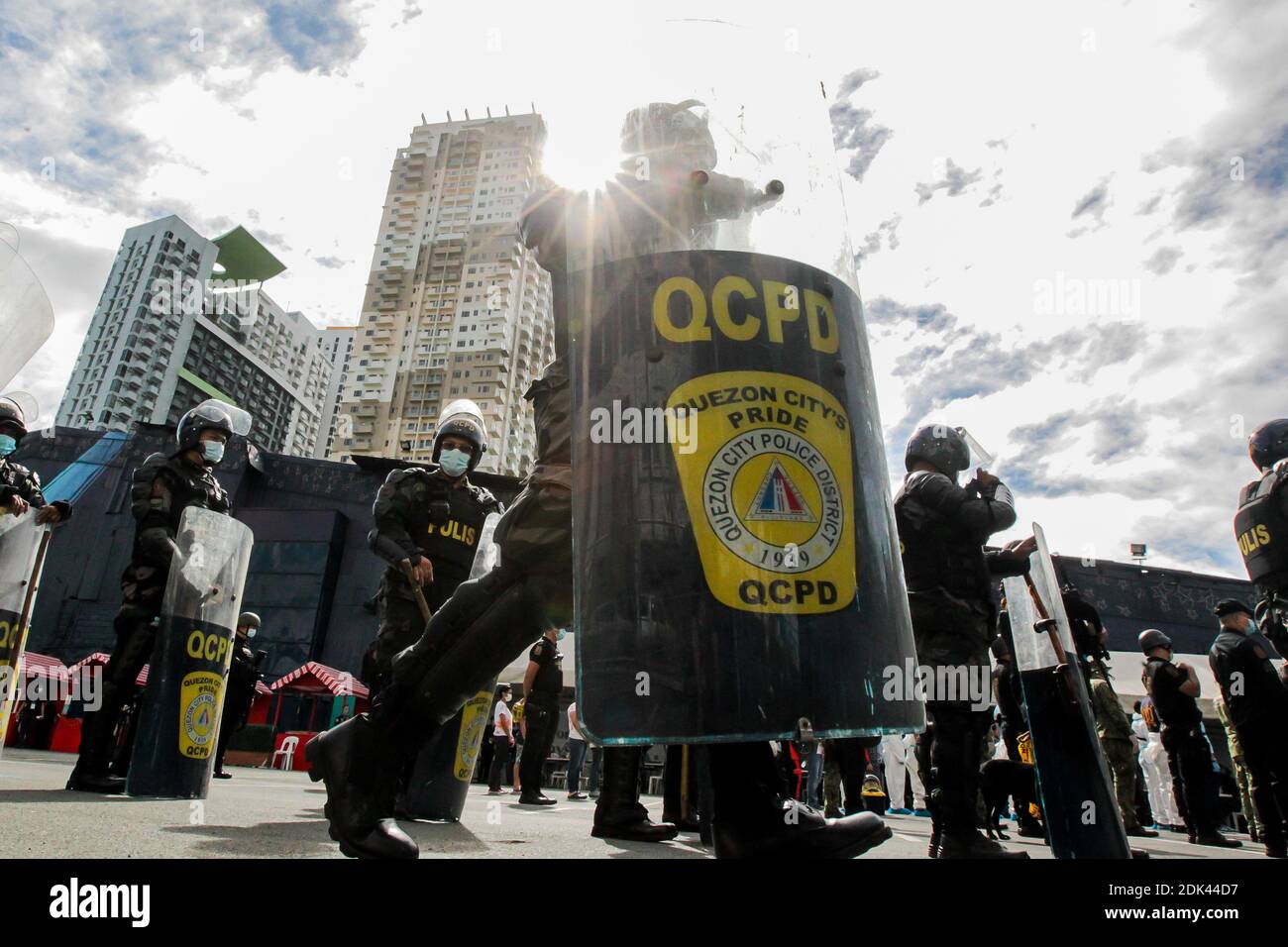 Quezon, Philippines. 15th Dec, 2020. Policemen are seen during a ...