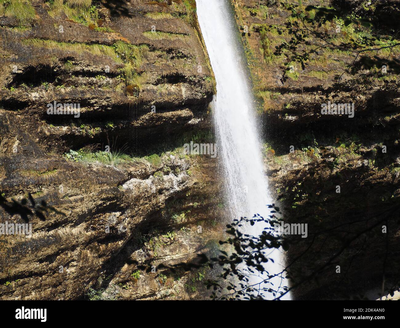 A beautiful scenery of the waterfall stream going through the rocks ...