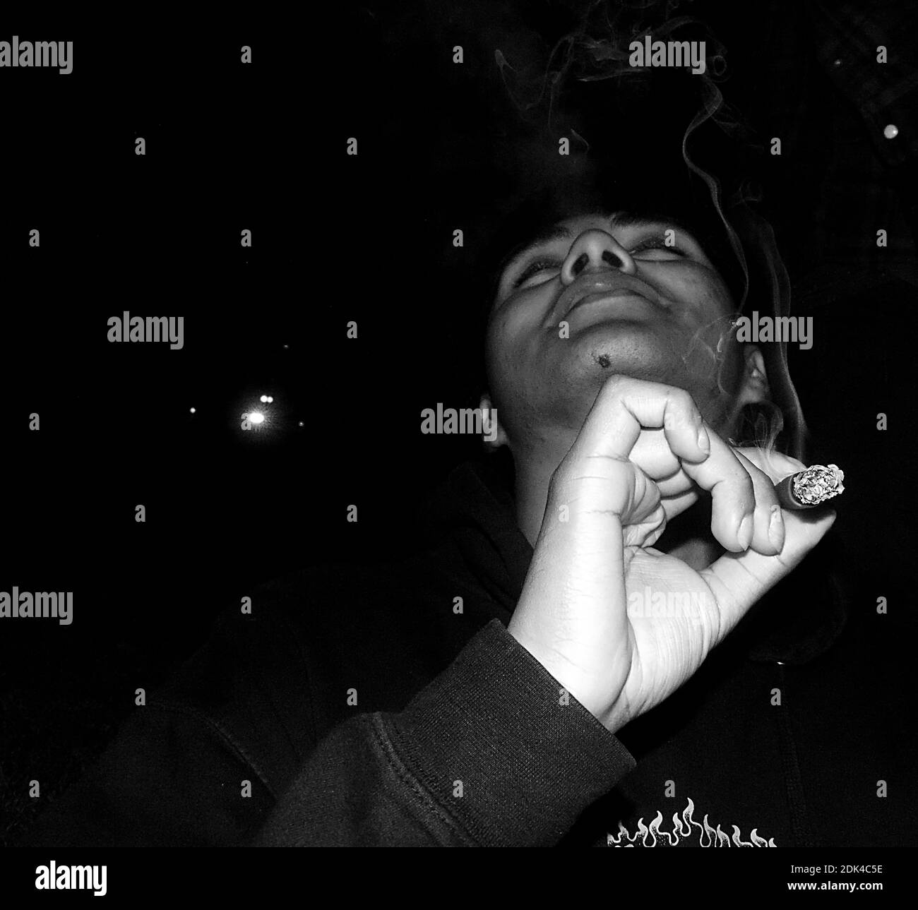 Black people smoking marijuana High Resolution Stock Photography and ...