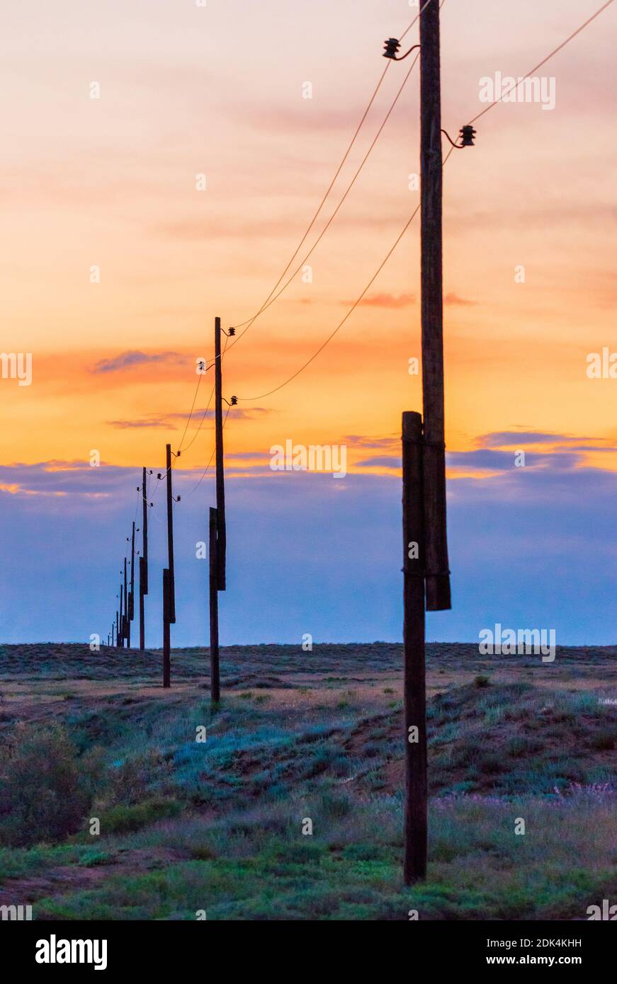 Wooden pylons with wires. Power line in rural Stock Photo - Alamy