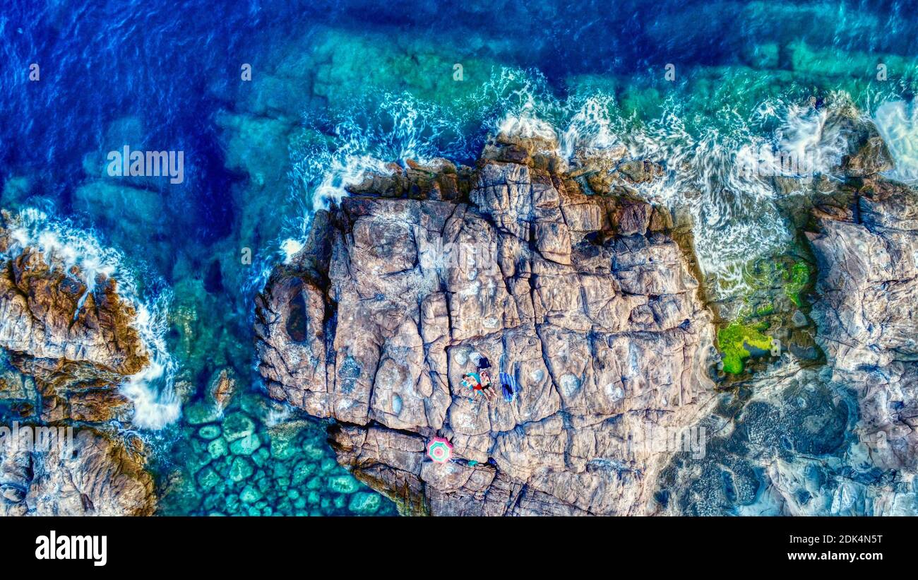 Aerial View Of Rocks In Sea Stock Photo - Alamy