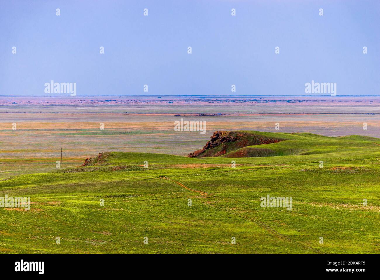 View of the salty lake Baskunchak. A stone similar to the head of an ...