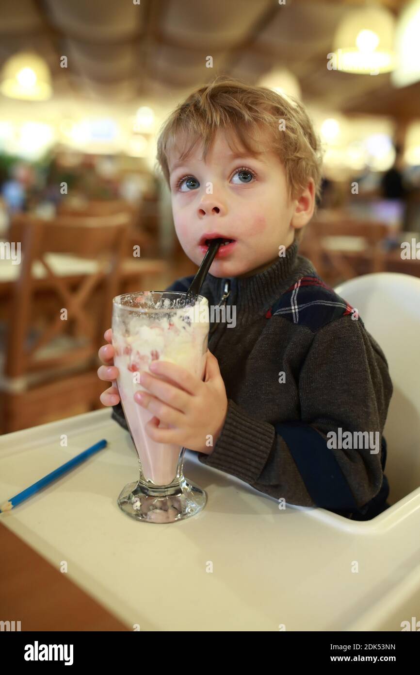 Milkshake glass restaurant boy hi-res stock photography and images - Alamy