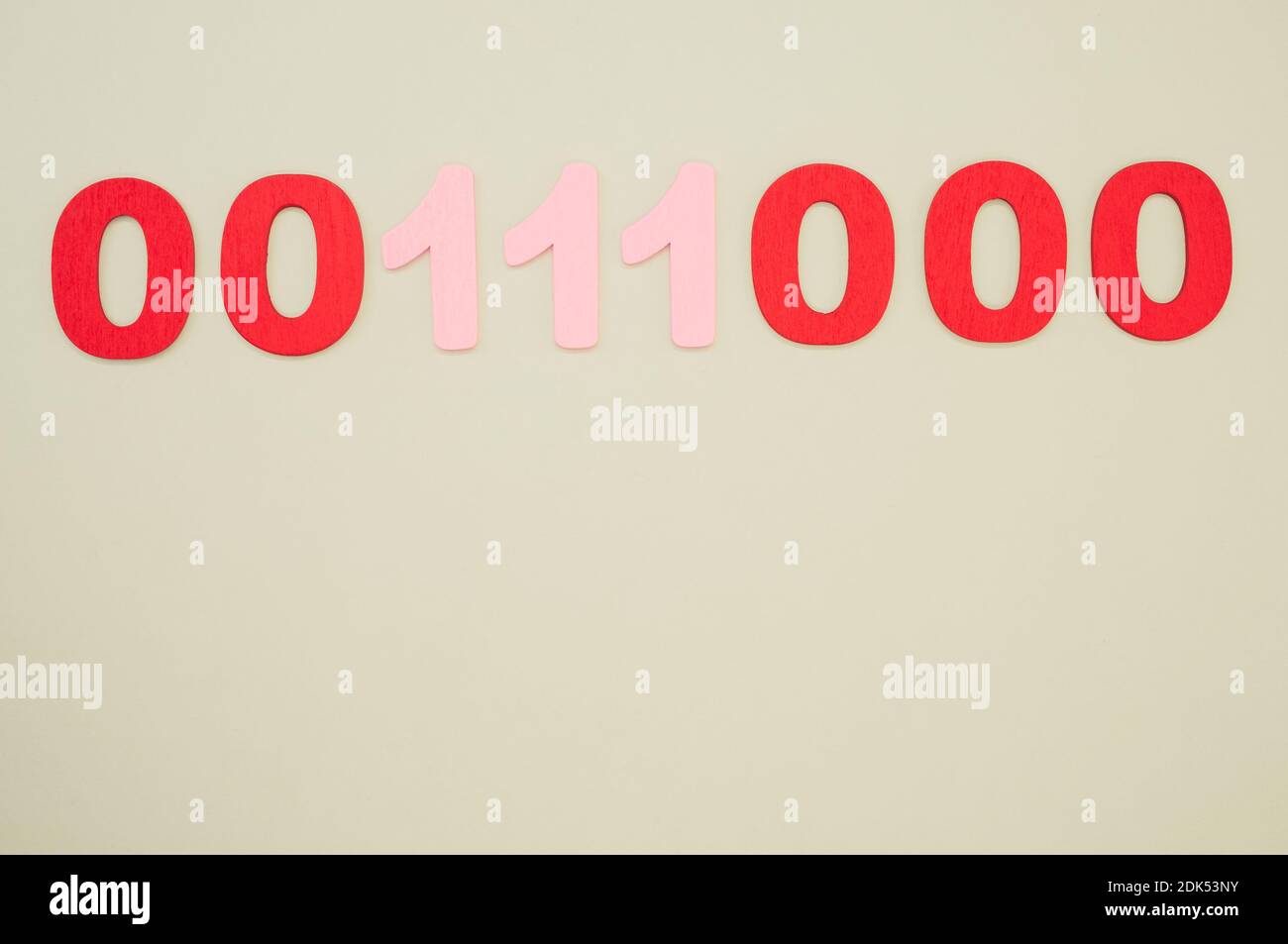 A top view of red and pink binary codes on a white surface Stock Photo ...