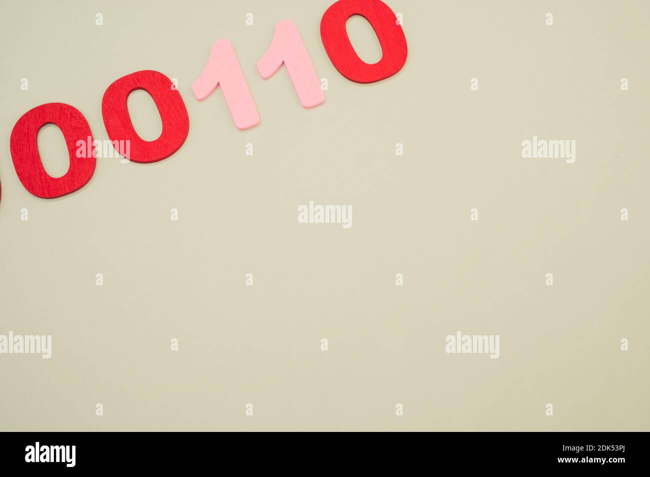 A top view of red and pink binary codes on a white surface Stock Photo ...