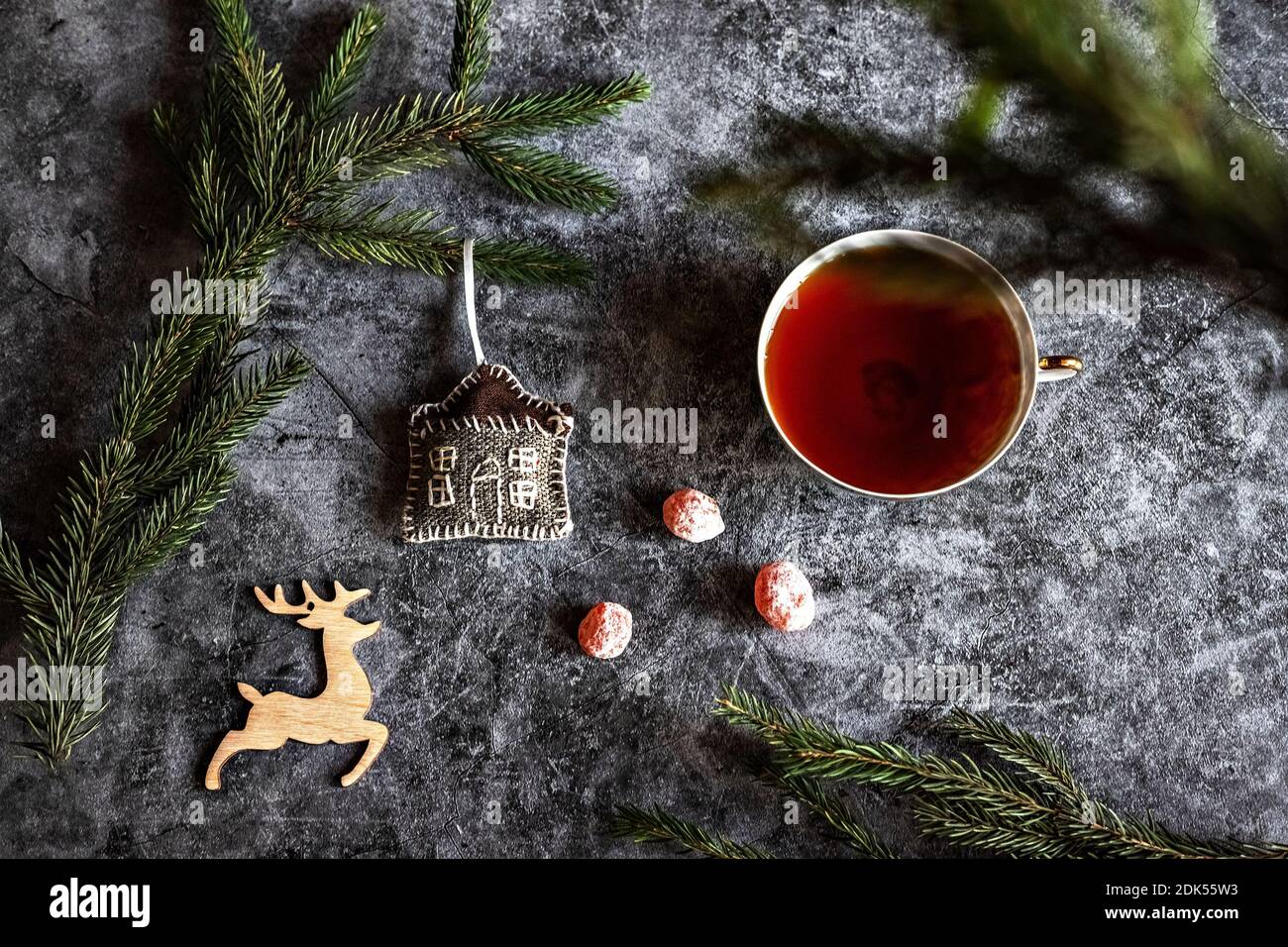 New Year's photo of cha on the table, dried kumquat, fir branches and ...