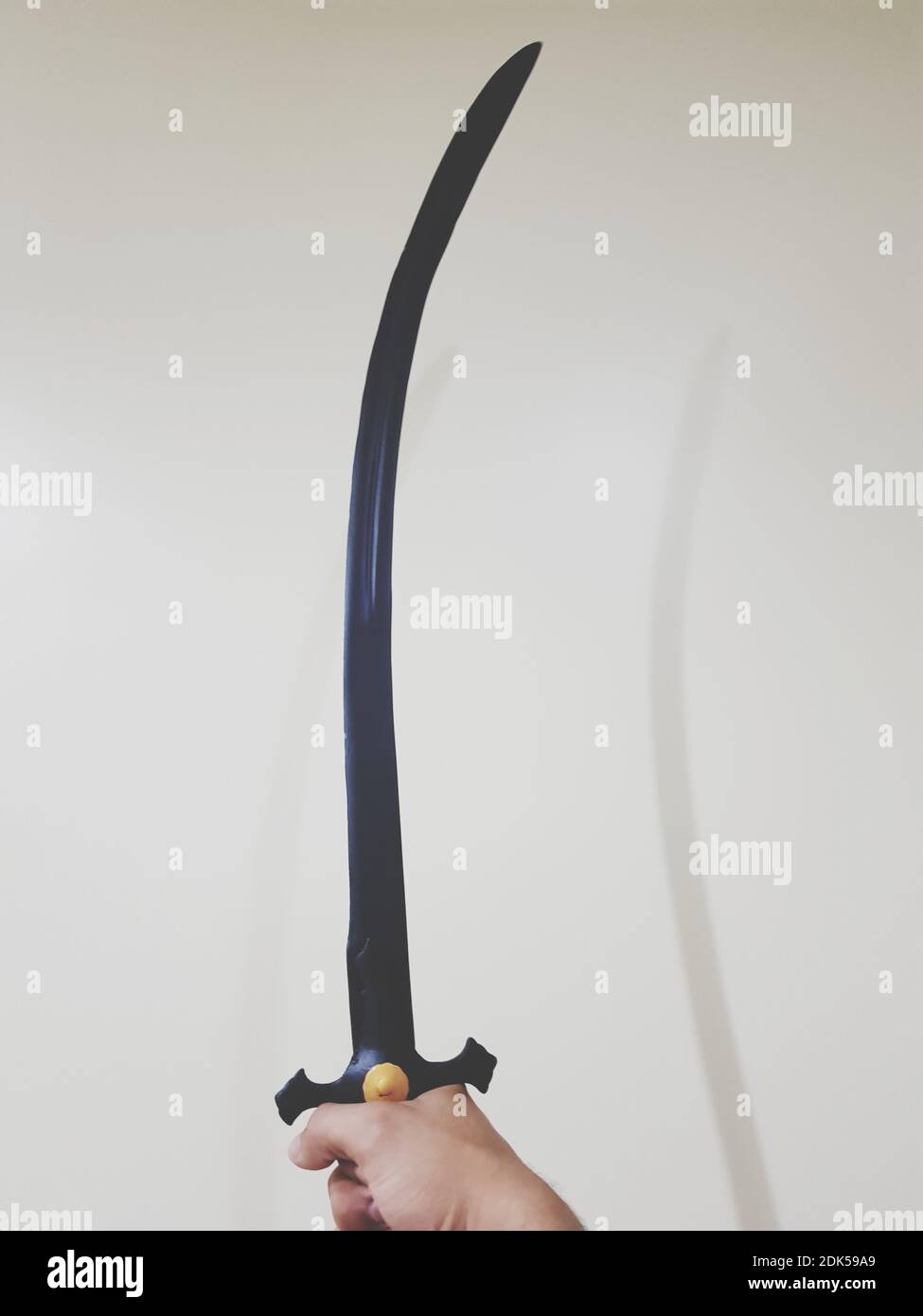 Hand holding sword first person hi-res stock photography and images - Alamy