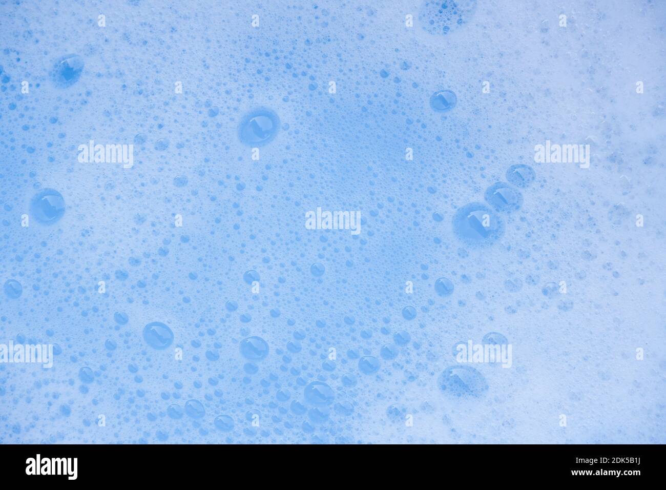 Abstract background white soapy foam texture. Shampoo foam with bubbles ...