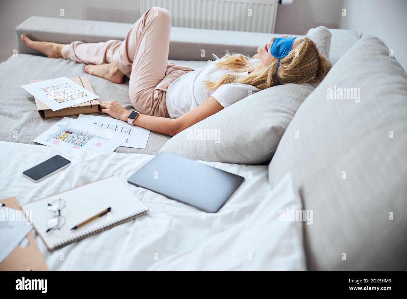 Positive delighted woman making pause during work Stock Photo - Alamy