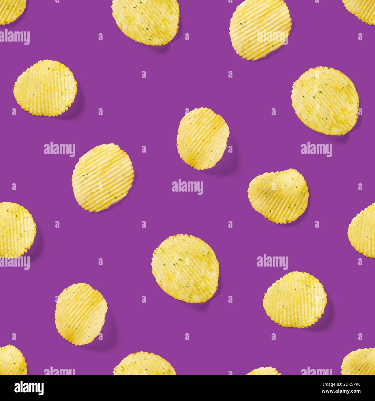 Seamless pattern made from Potato chips on purpule background flat lay ...