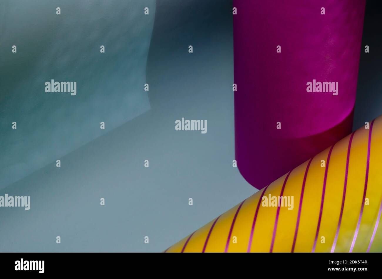 x‰Creative abstract purple and yellow composition on a light blue ...