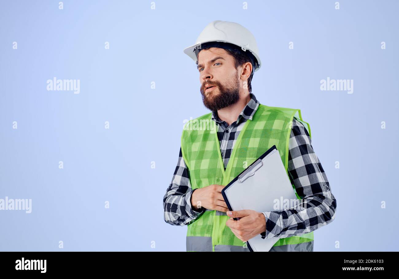 man in builder uniform white helmet professional construction work ...