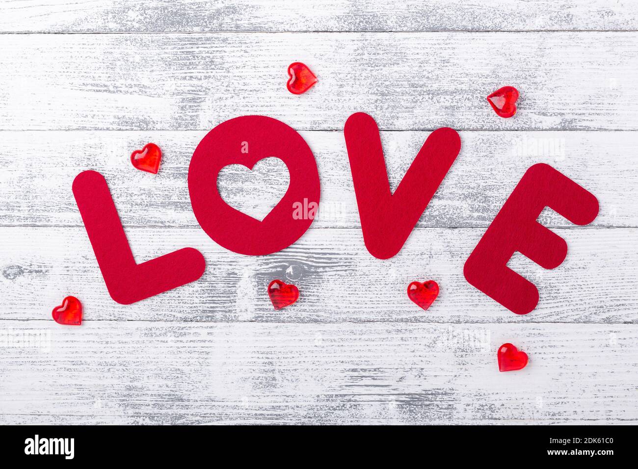 Word Love on white wooden background Red textile letters Top view Stock ...