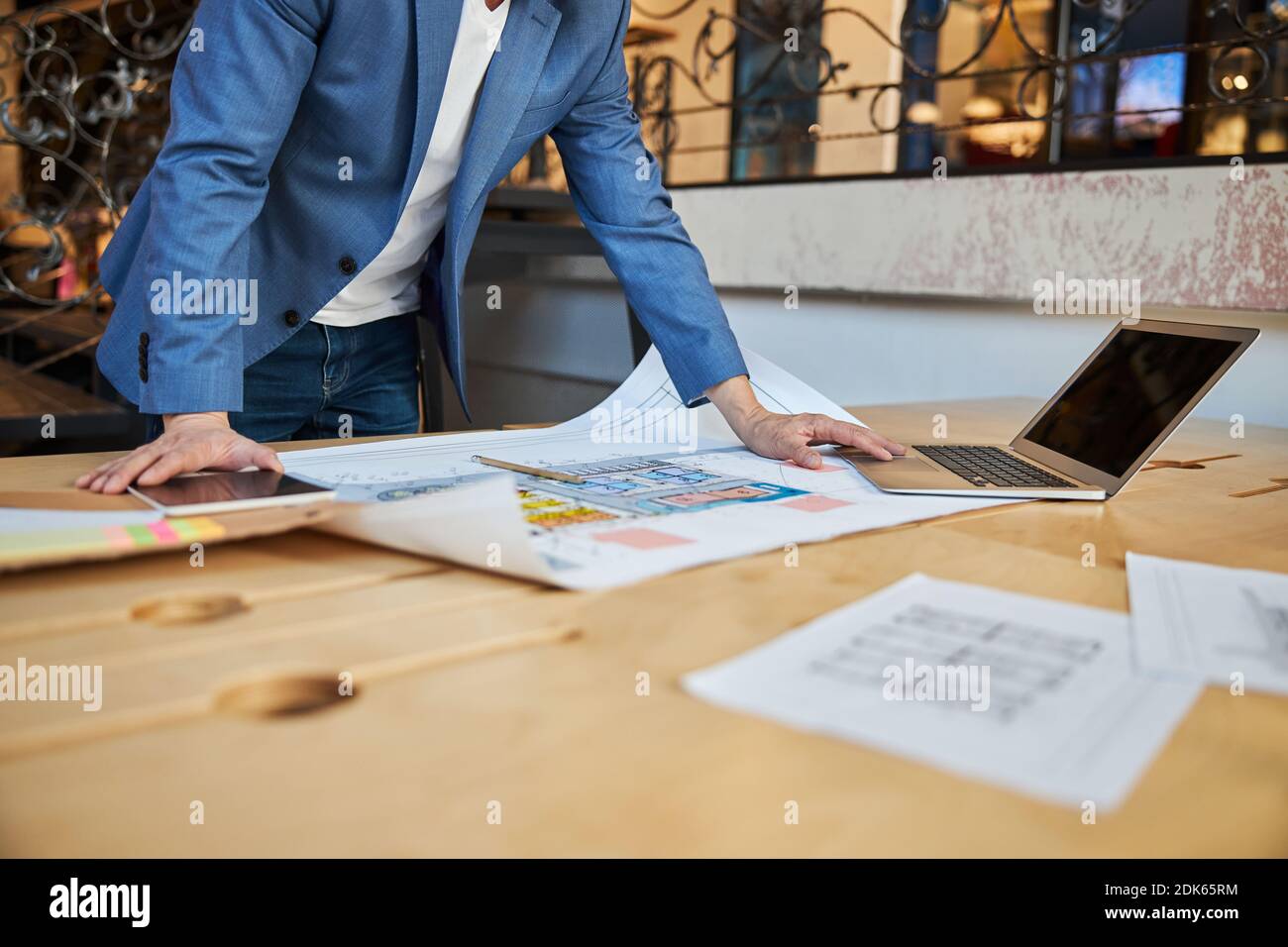 Busy employee being overloaded with work assignments Stock Photo - Alamy