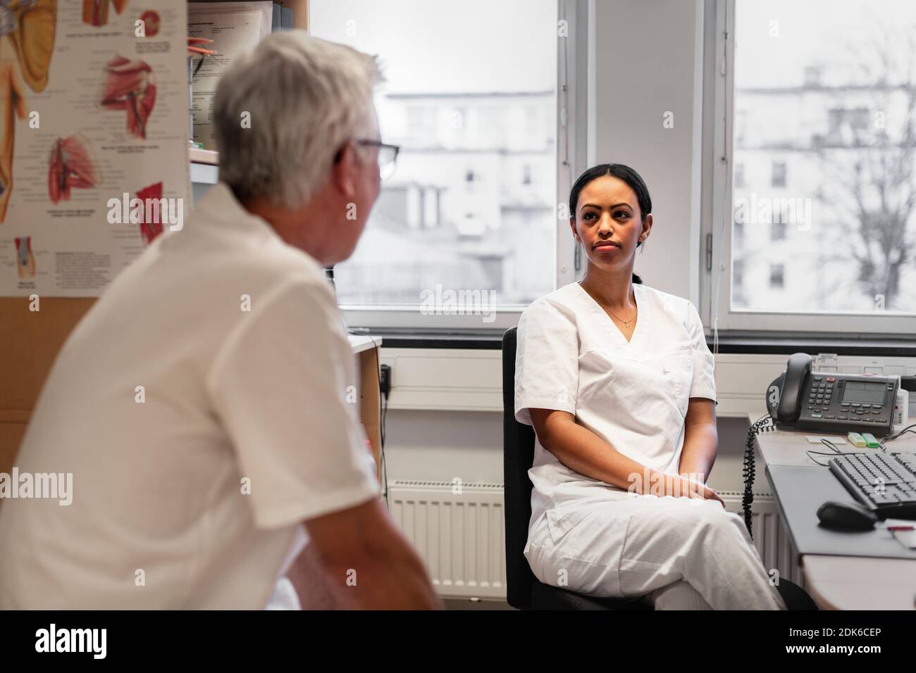 Medical doctor talking colleagues hi-res stock photography and images ...