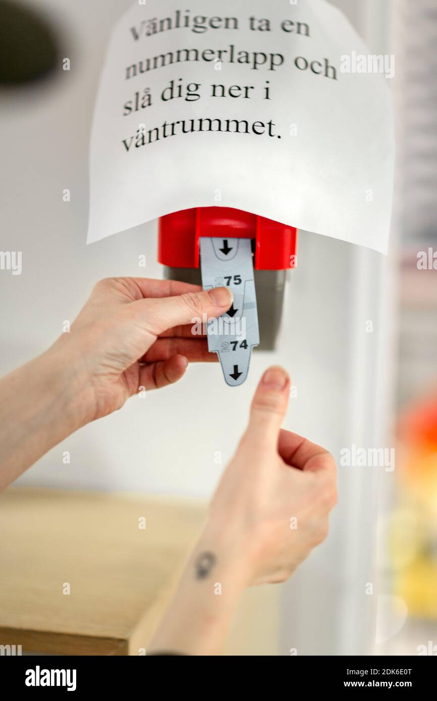 Hand taking number Stock Photo - Alamy