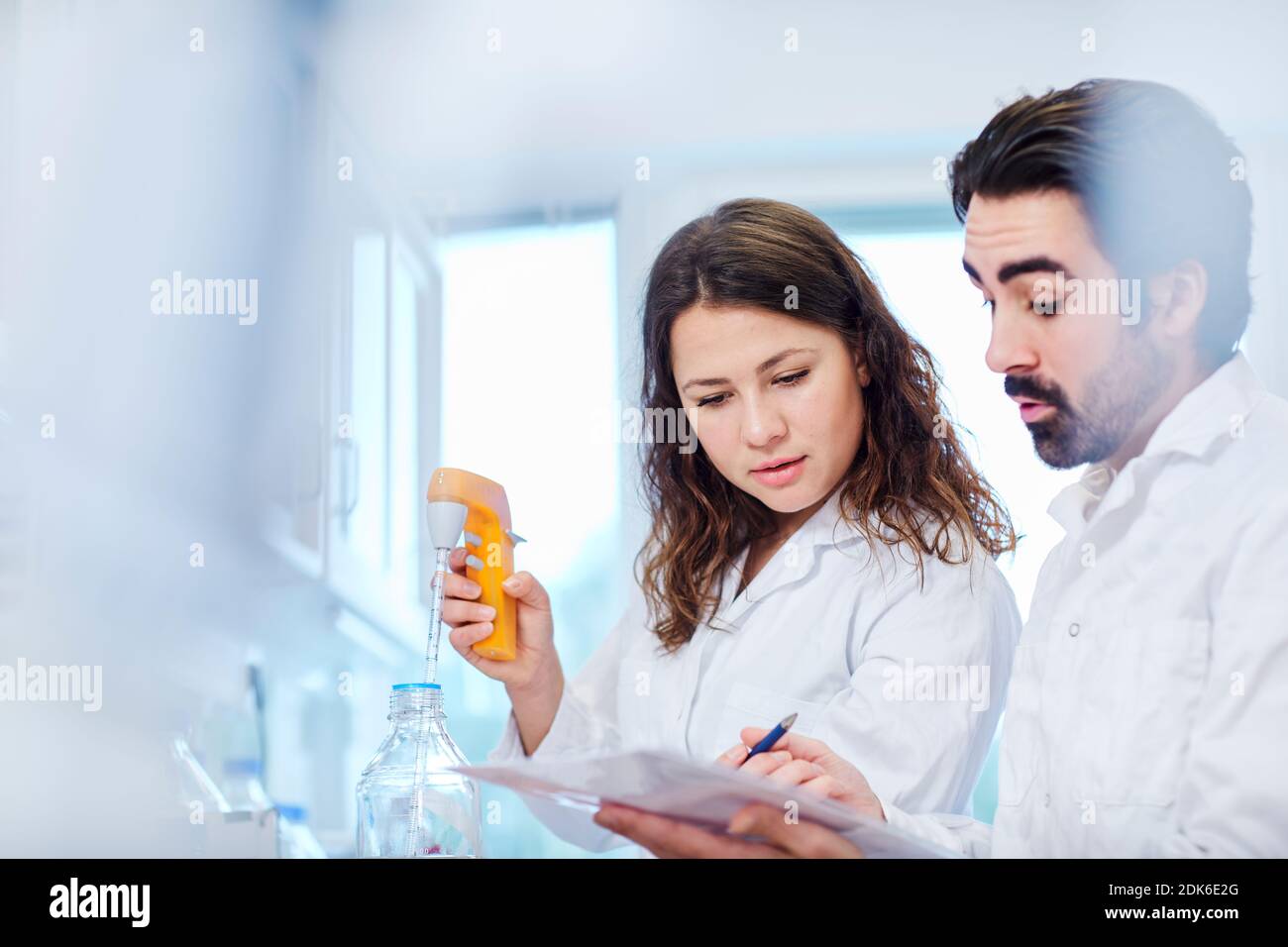 Scientists working in laboratory Stock Photo - Alamy