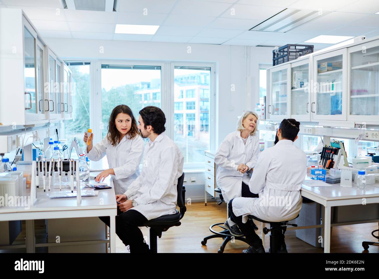 Scientists working in laboratory Stock Photo - Alamy
