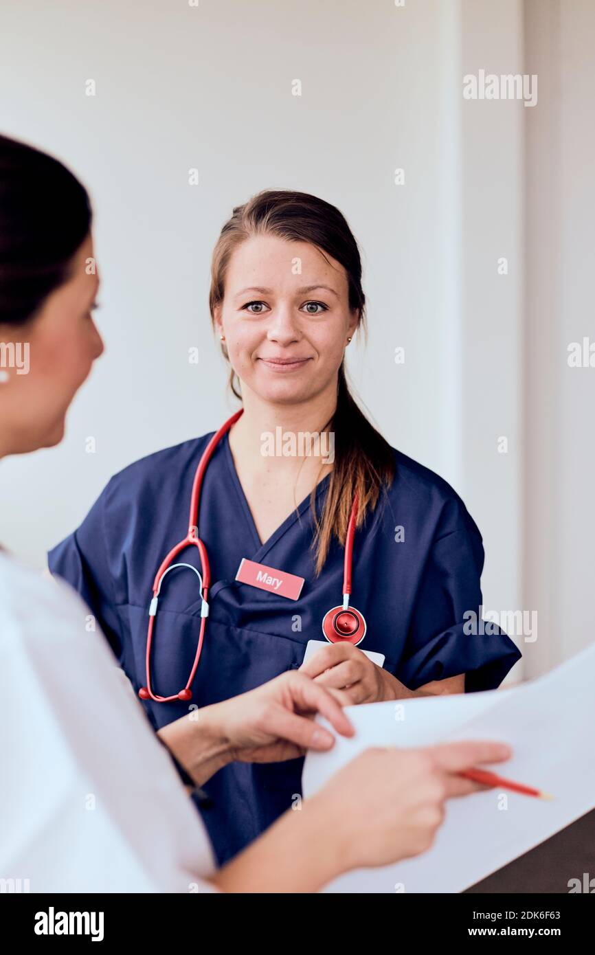 Female doctor looking at camera Stock Photo - Alamy