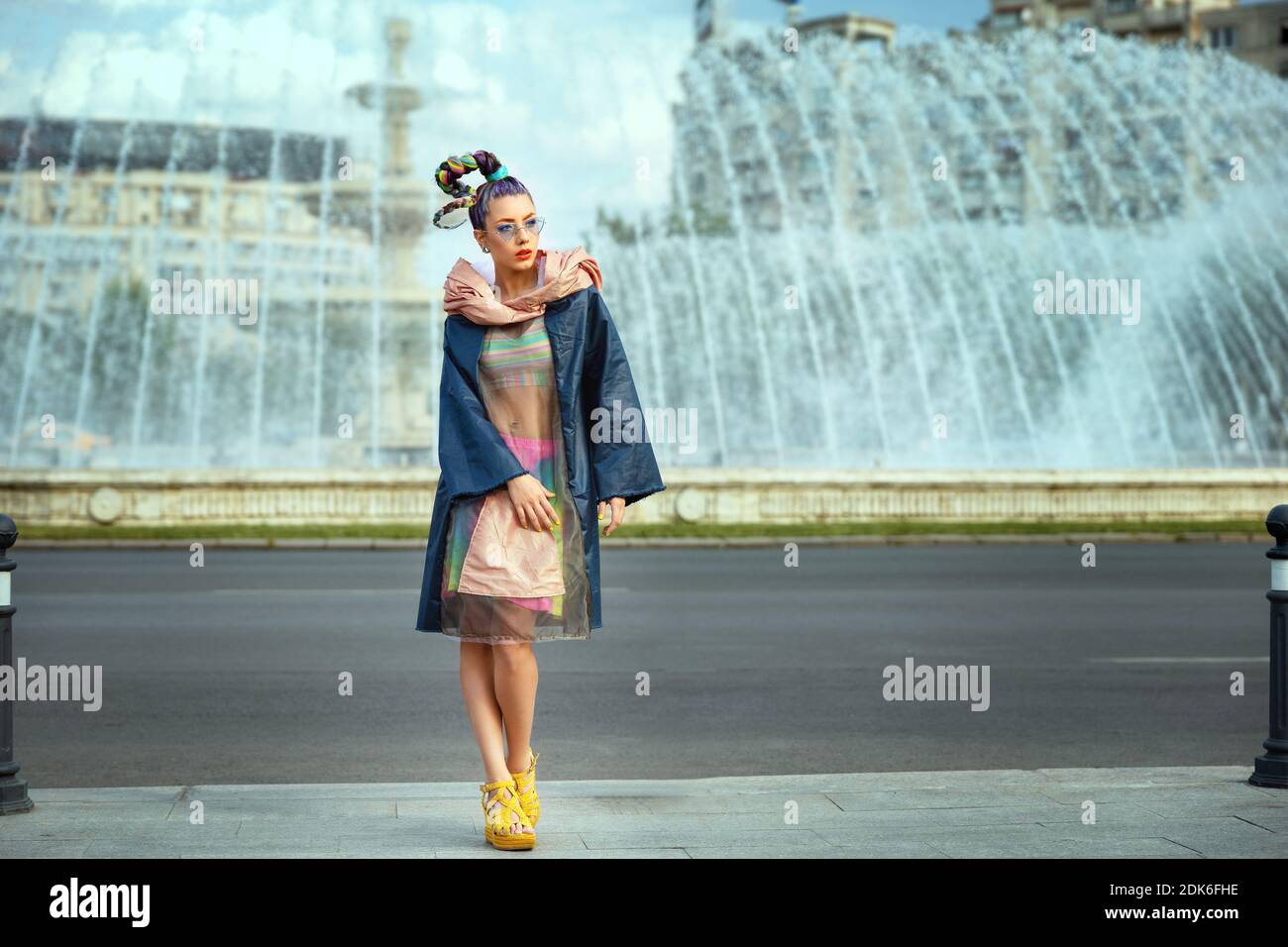 Young woman dancing fountain hi-res stock photography and images - Alamy