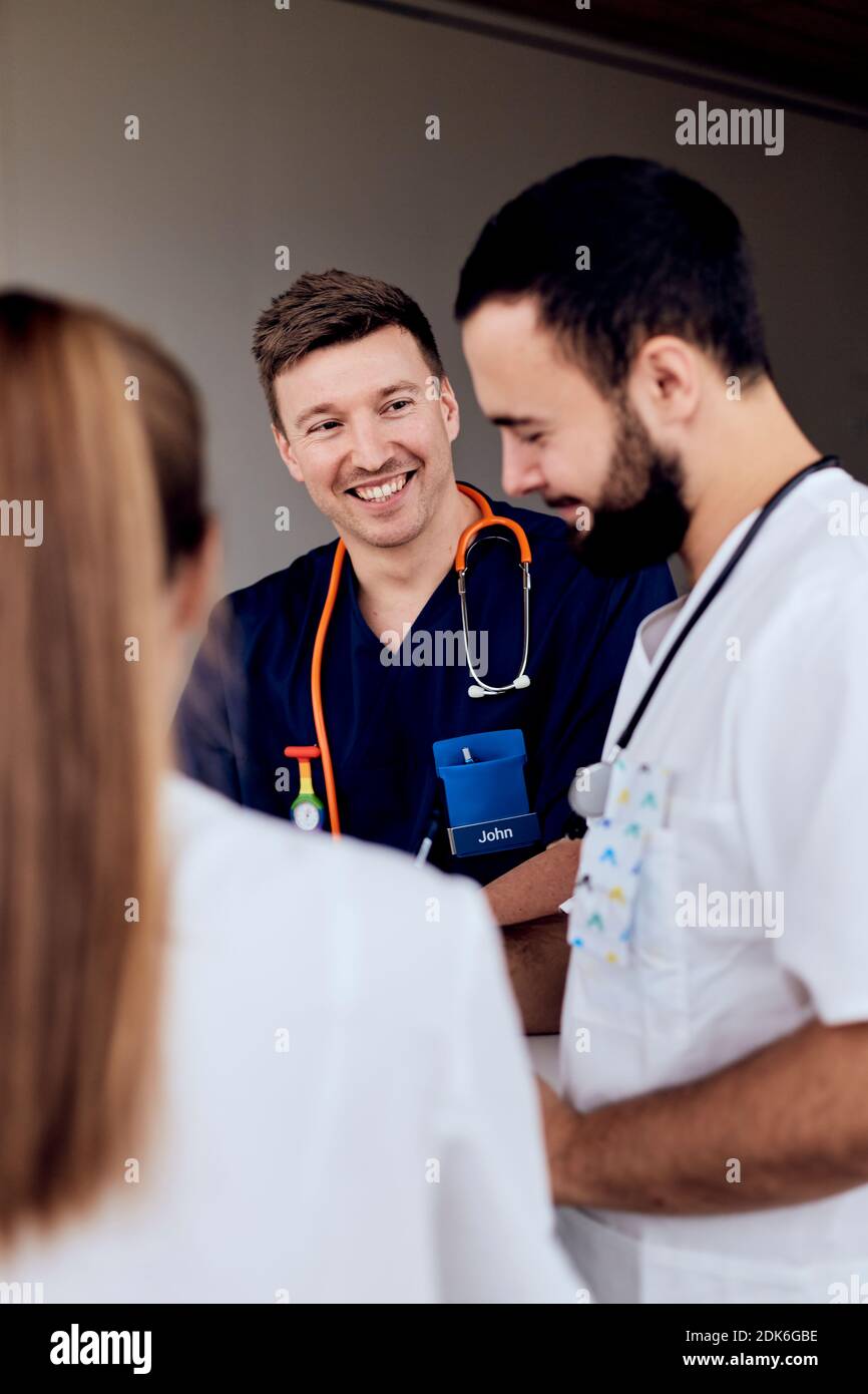Doctors talking to each other Stock Photo - Alamy