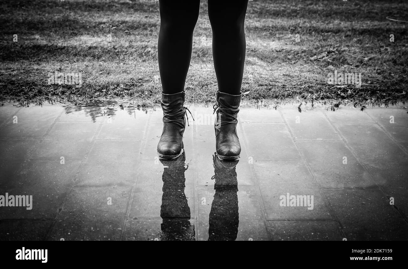 Child puddle adult splash hi-res stock photography and images - Alamy