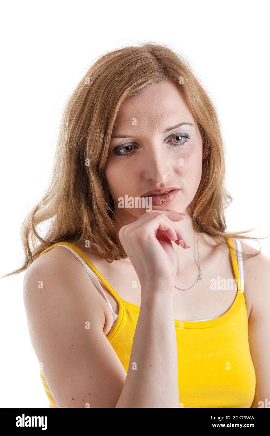 Woman holding hand against her cheek hi-res stock photography and ...