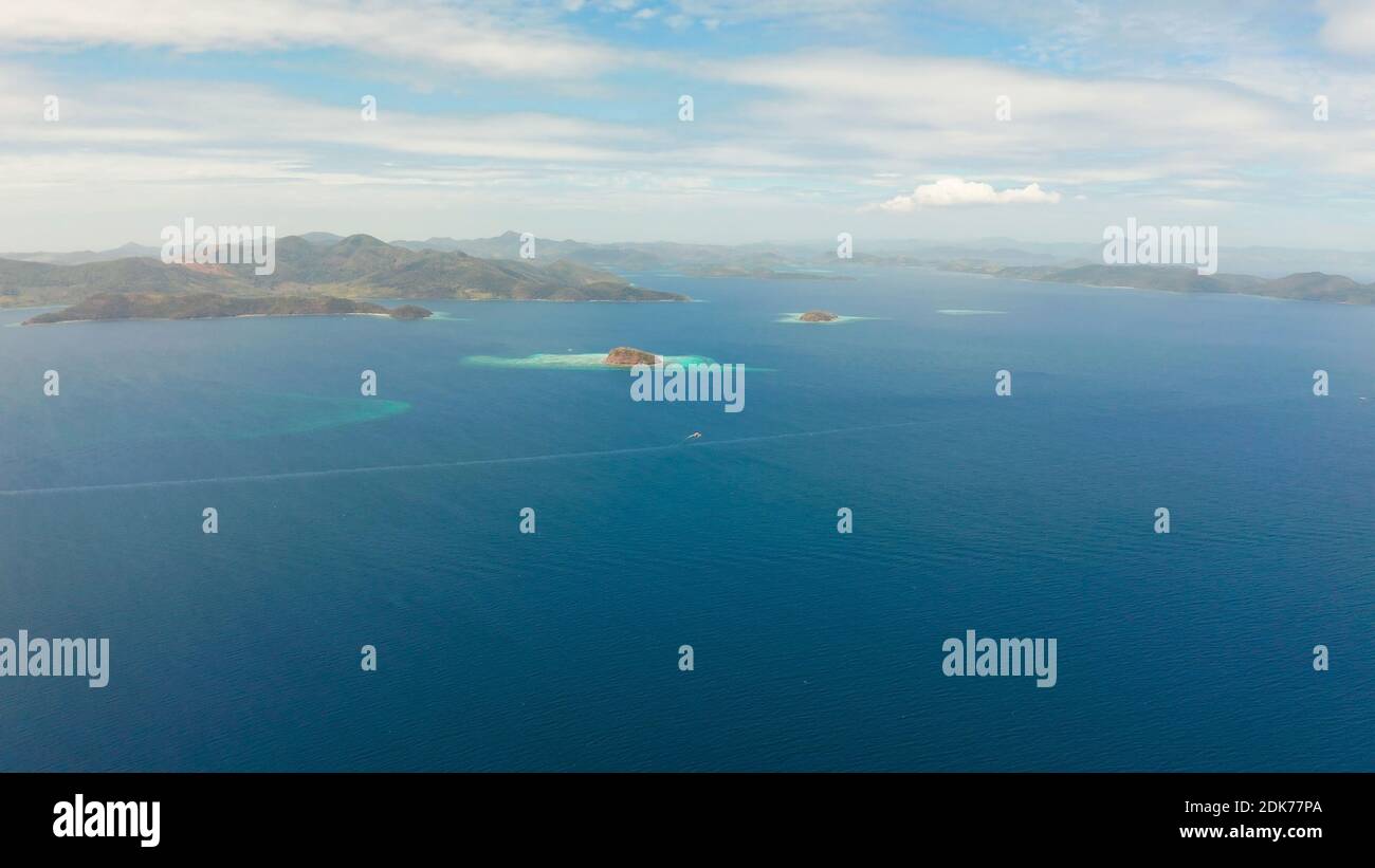 aerial seascape Lagoons with blue, azure water in middle of small ...