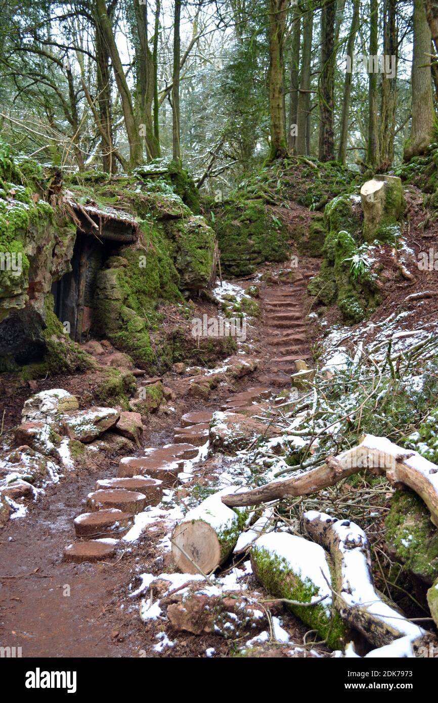 Hobbit house door at Puzzlewood in winter, with snow on the ground ...