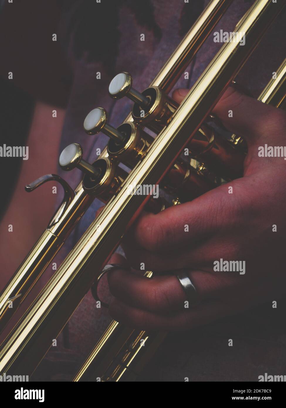 Playing trumpet one hand hi-res stock photography and images - Alamy