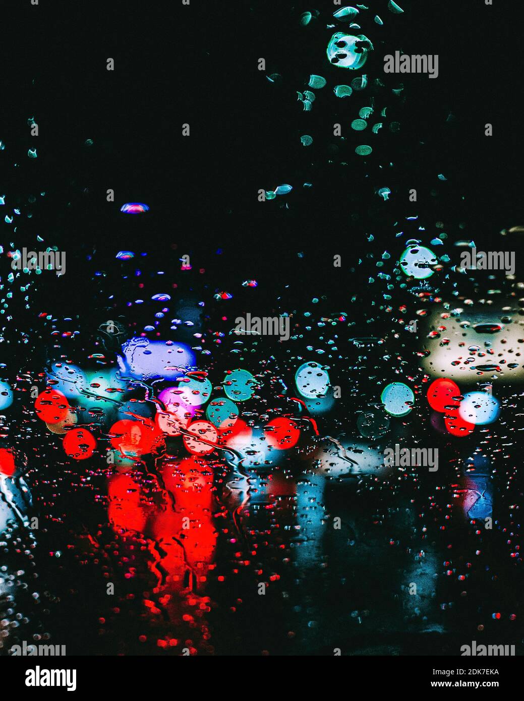 City through rainy window at night hi-res stock photography and images ...