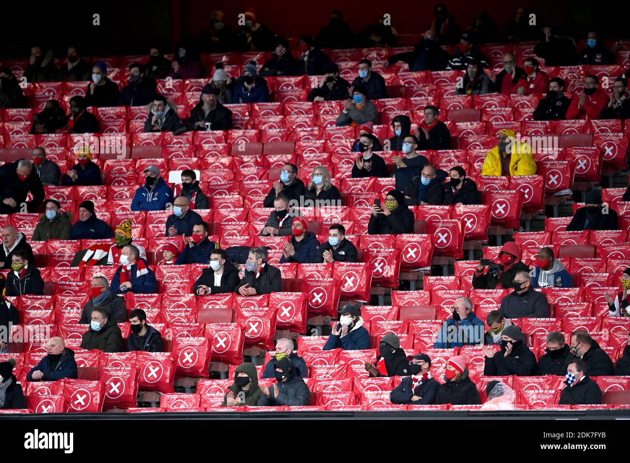 File photo dated 13-12-2020 of Socially distanced Arsenal fans watch ...