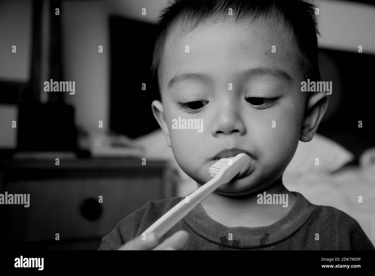 Boy brushing his teeth Black and White Stock Photos & Images - Alamy