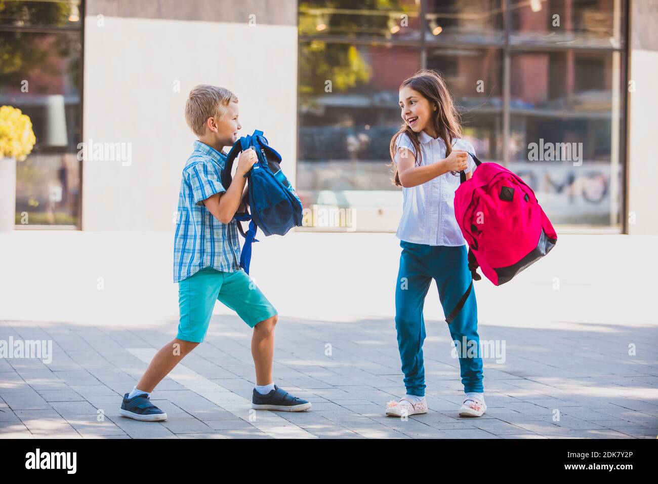 Let's make a backpack fight after school lessons Stock Photo - Alamy