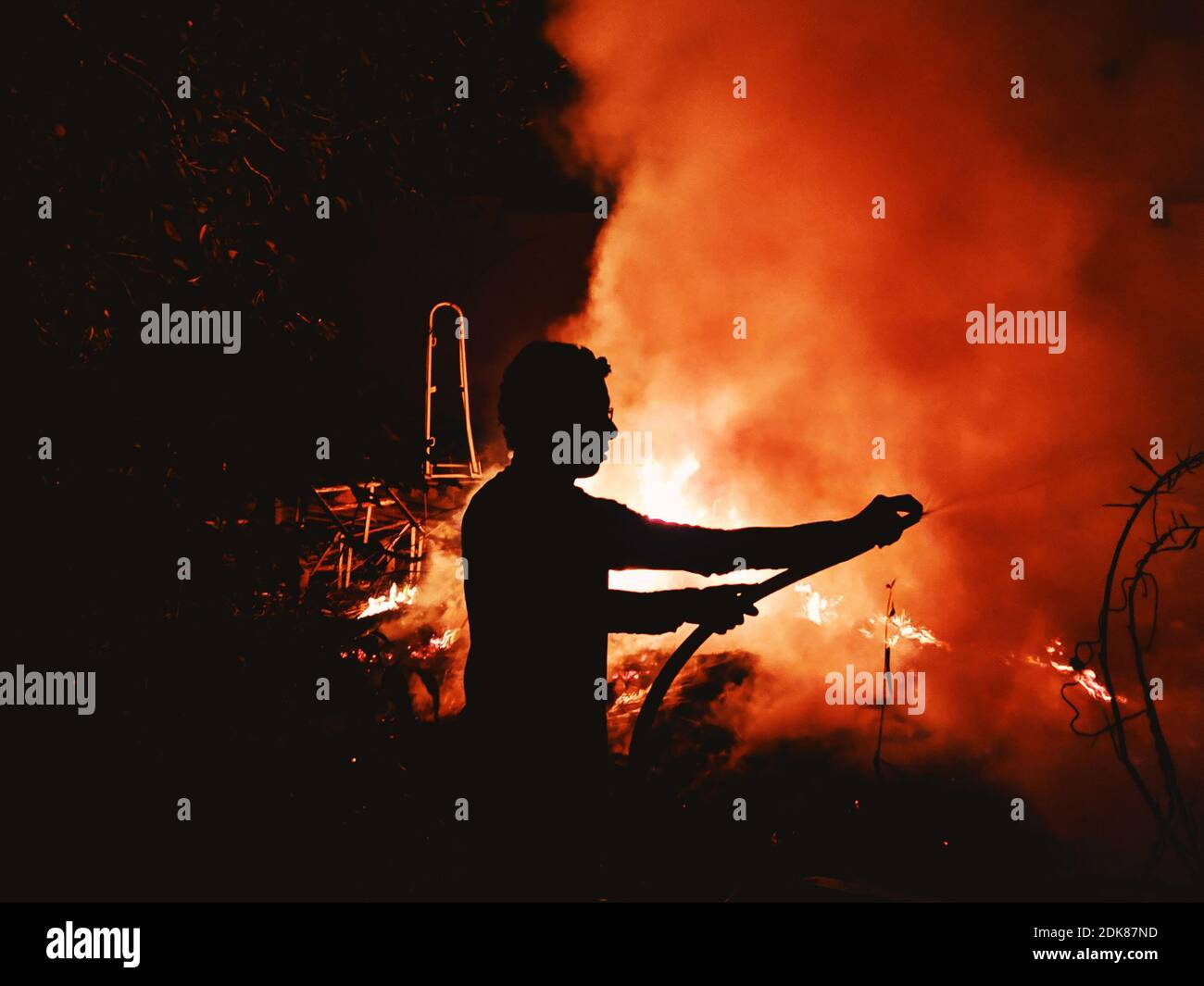 Man extinguishing campfire hi-res stock photography and images - Alamy