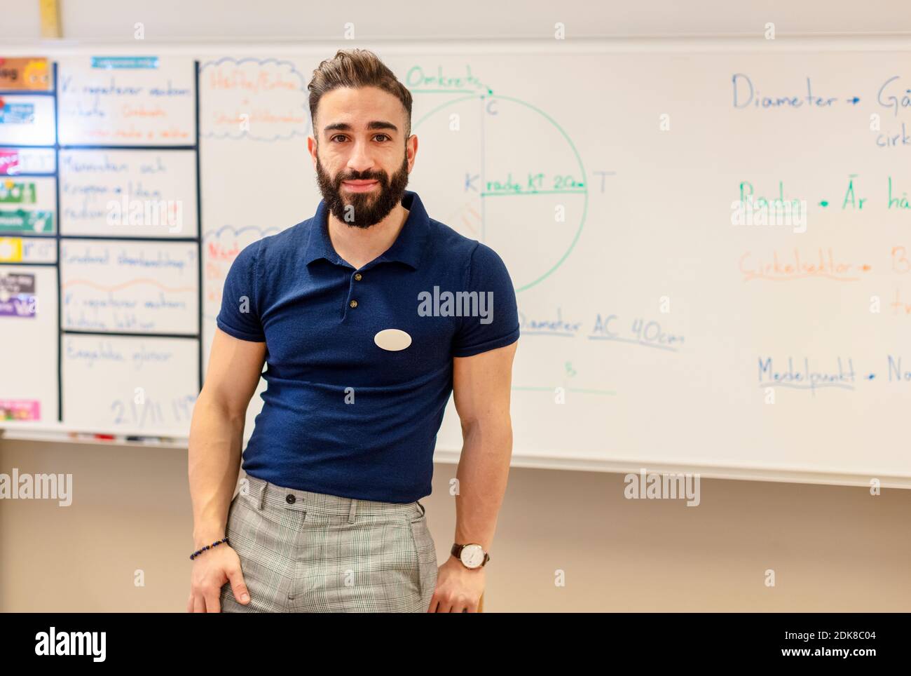 Teacher standing hi-res stock photography and images - Alamy