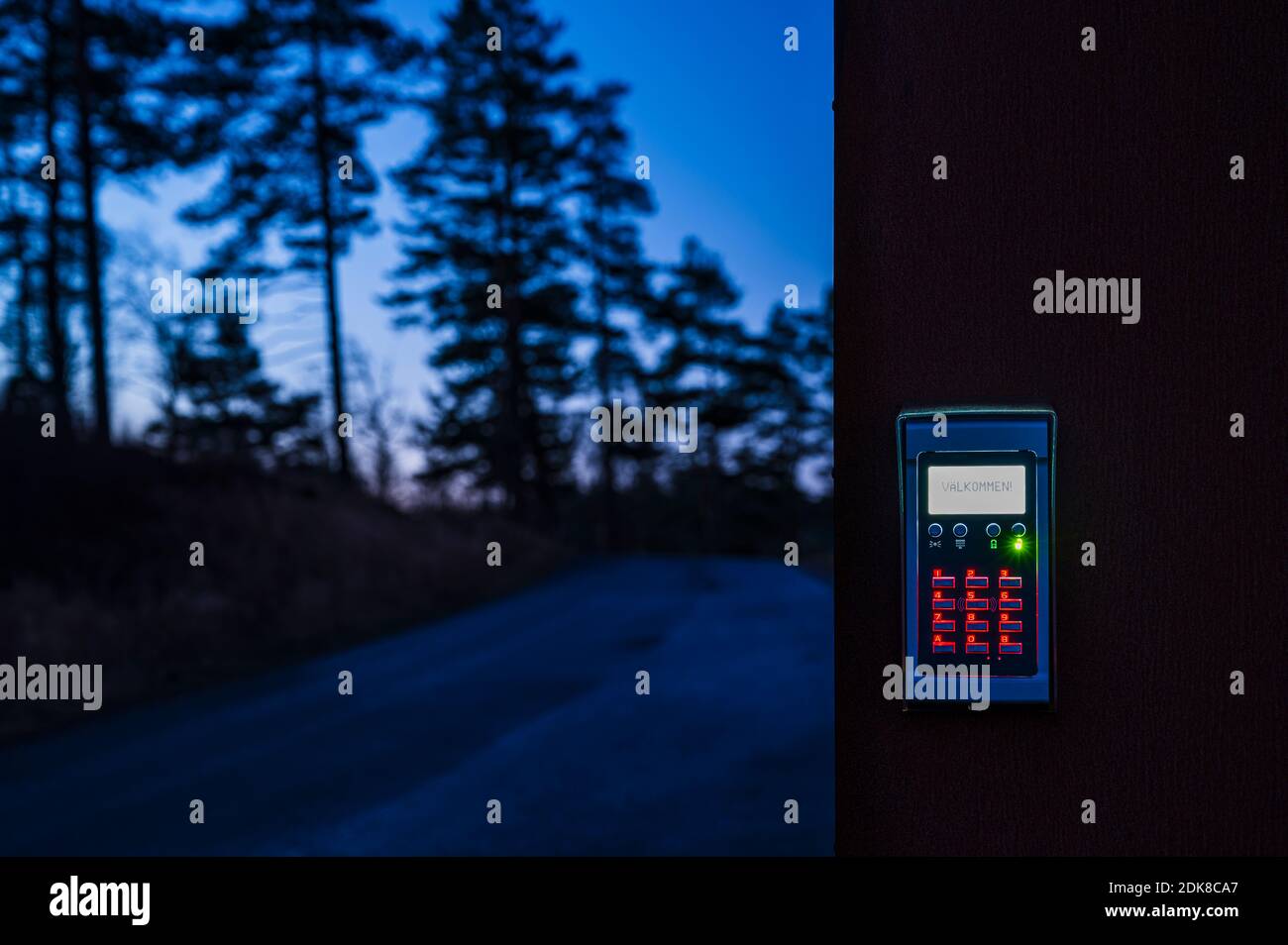 Illuminated keypad at dusk Stock Photo - Alamy