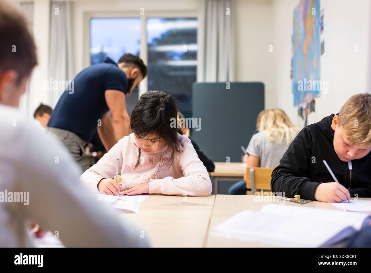 Children sitting in classroom Stock Photo - Alamy